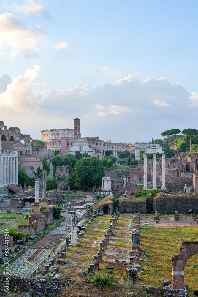 Perspective of the Roman Forum ancient ruins and Colosseum ampitheater ...