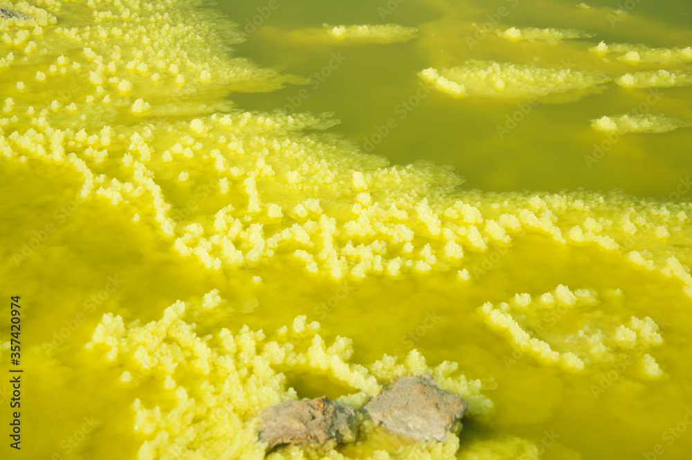 Geothermal acid pool with sulfur, potassium, salt mineral in in crater ...