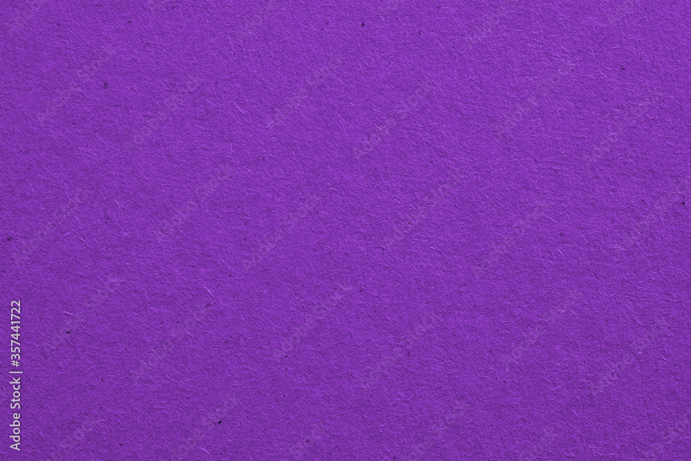 The surface of dark violet cardboard. Rough paper texture with ...