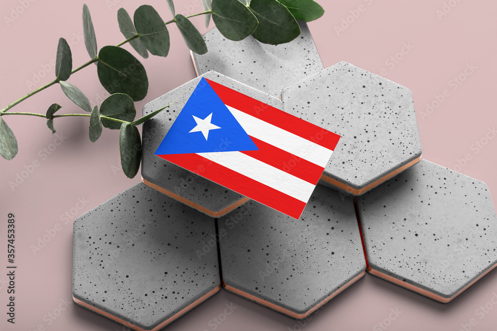 Puerto Rico flag on hexagon stylish stones. Pink copy space background ...