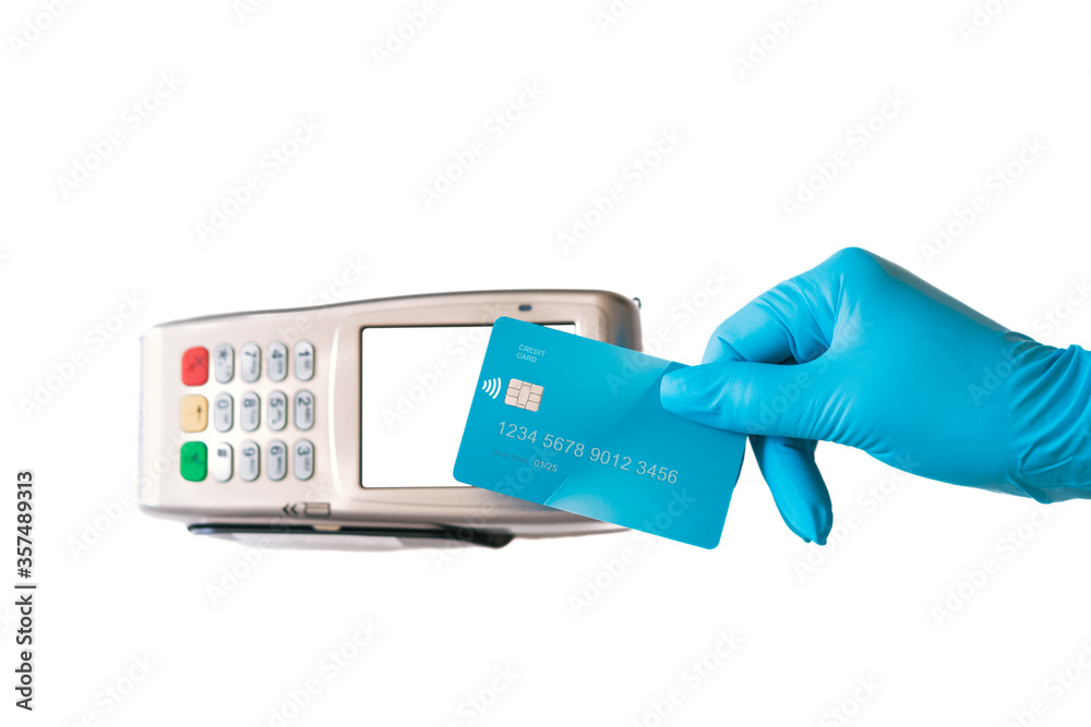 hand with gloves passing your credit card through the contactless ...