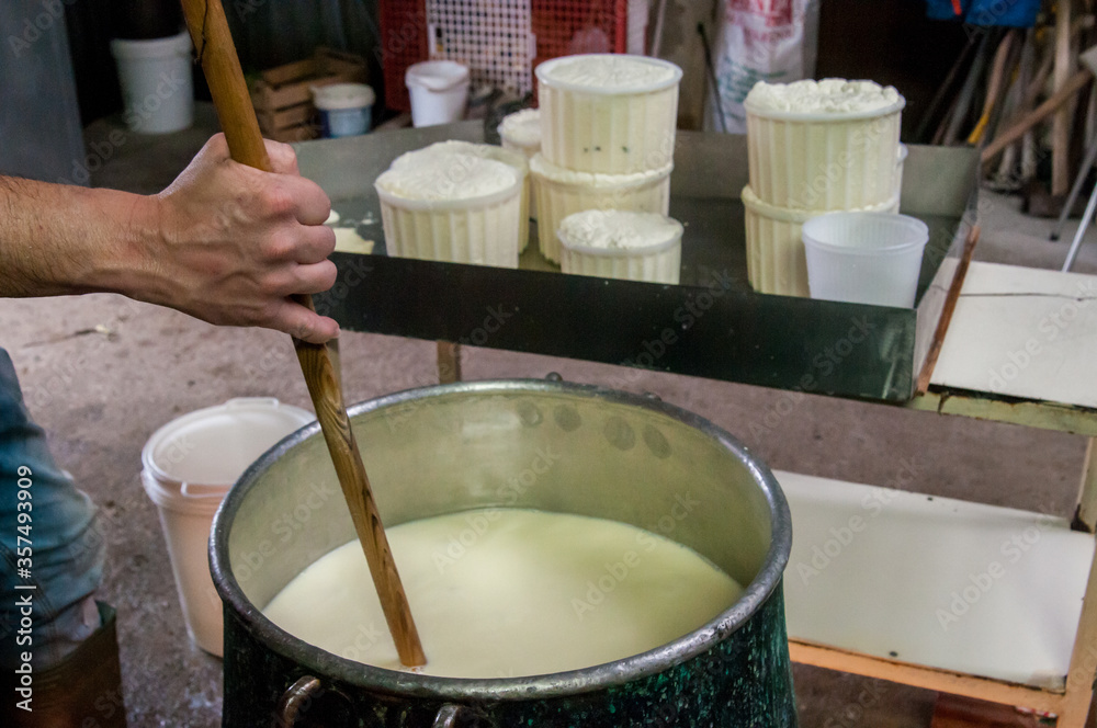 The making of tuma and ricotta cheese Stock Photo | Adobe Stock