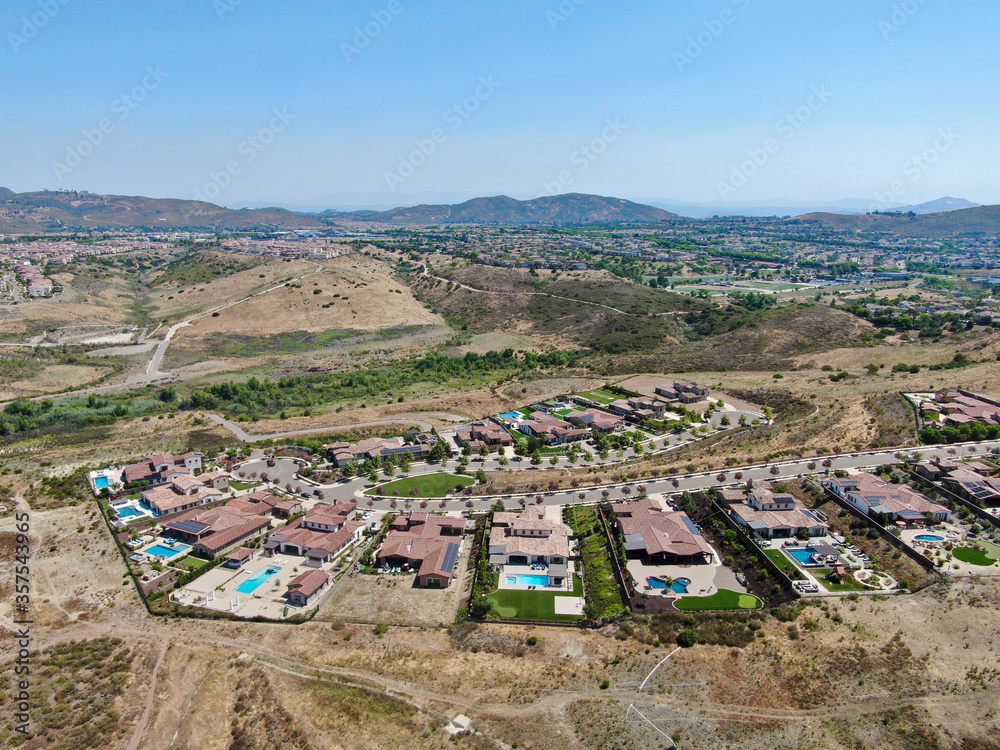 Aerial view of high class neighborhood with residential mansions and ...