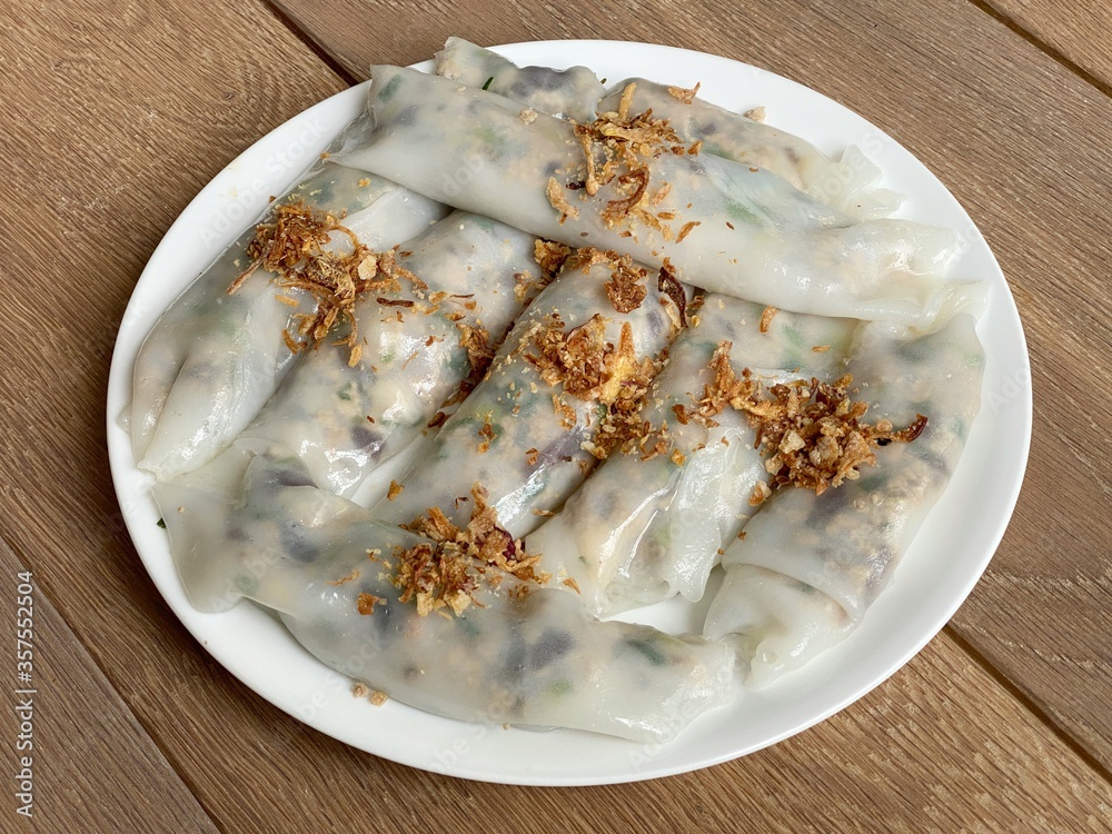 Vietnamese steamed rice rolls stuffed with mince pork and chives with ...