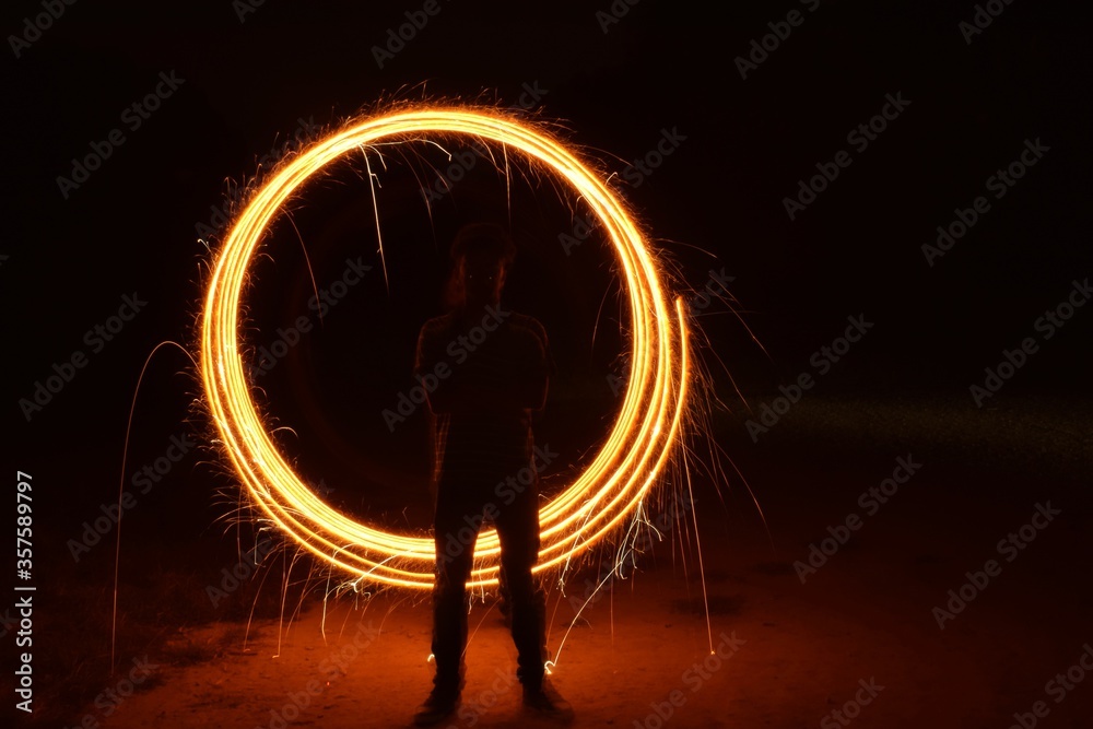 circle light trails fireworks in the night Stock Photo | Adobe Stock