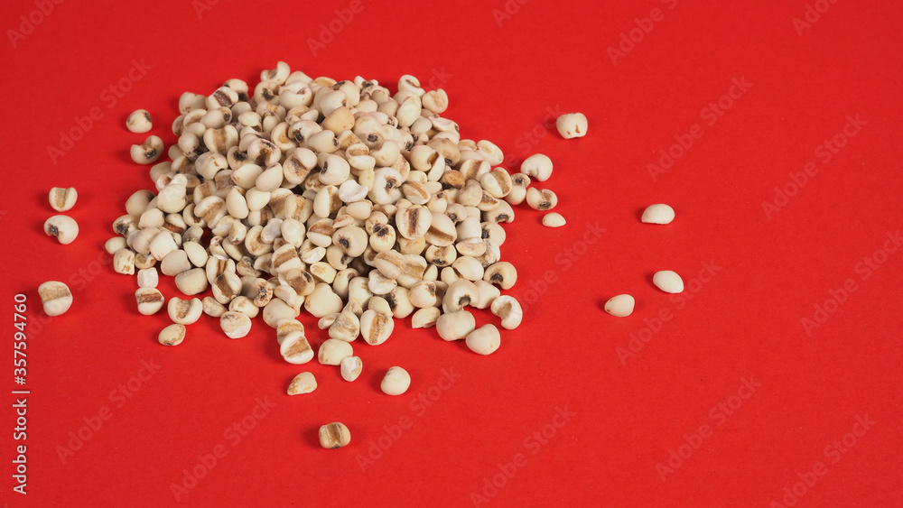 Job's Tears, also known as adlay and coix on red background. Popular in ...