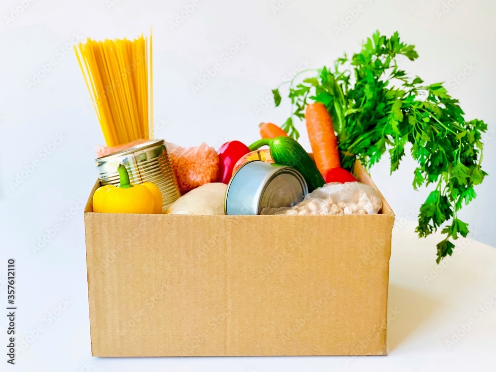 Donation box with food isolated on white. Box full of groceries ...