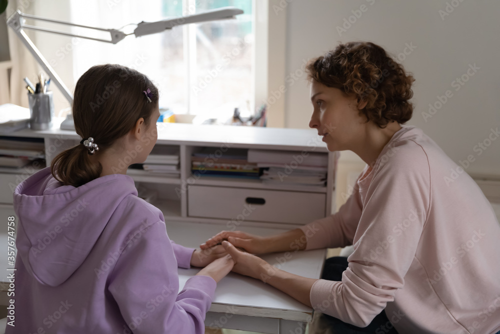 Loving mother comfort support unhappy depressed teen daughter suffering ...