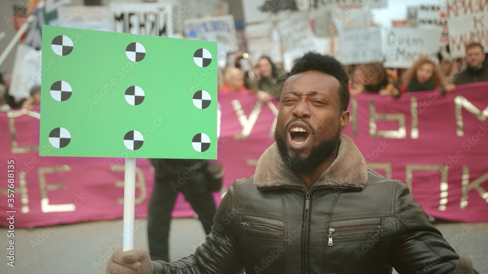 African american man hold banner in hand. Tracking points. Copyspace ...