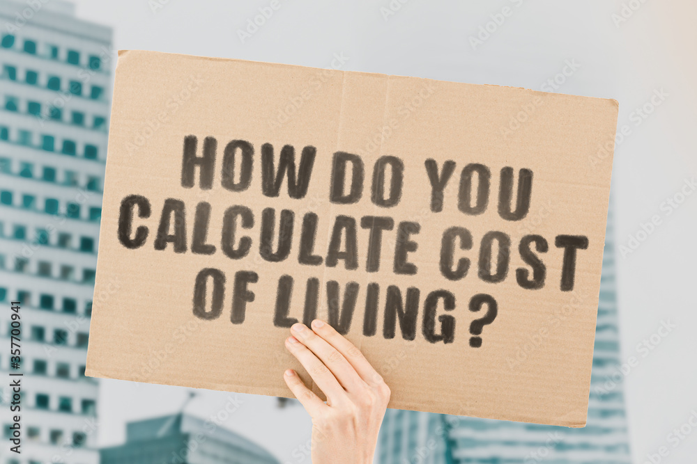 The phrase " How do you calculate cost of living? " on a banner in men ...