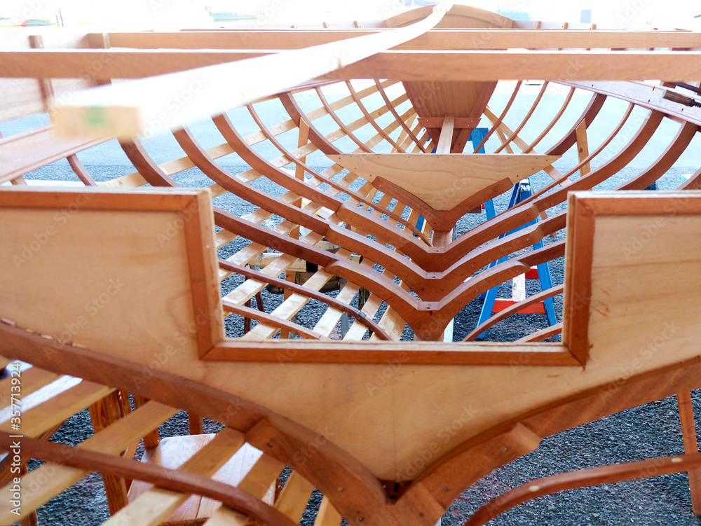 Foto de Structure of a small wooden boat in small boatyard construction ...