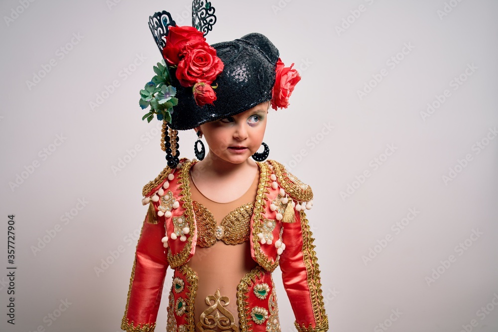 Young little caucasian kid girl wearing bullfighter traditional folkore ...