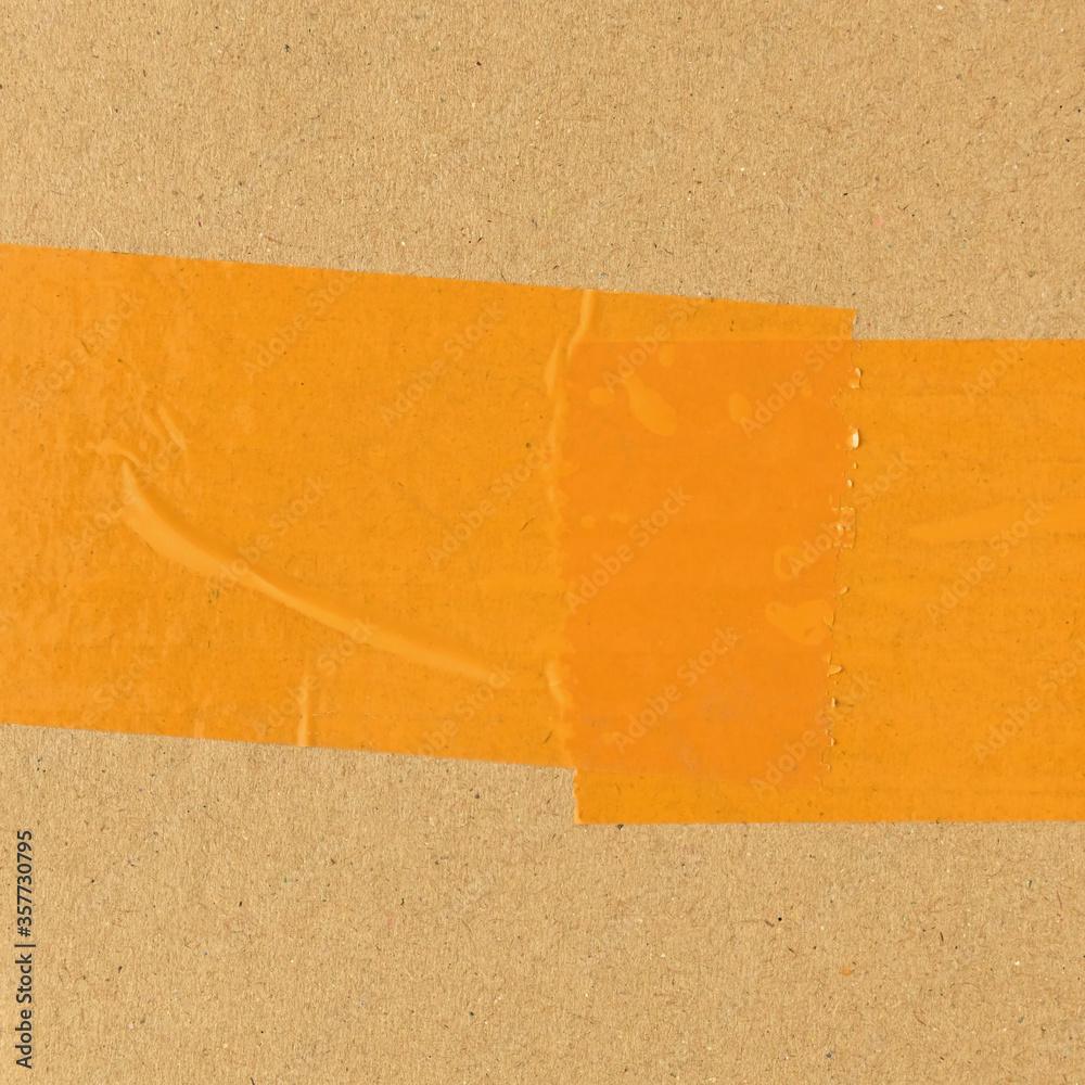 scotch tape stick wrapping on brown carton paper box package of ...