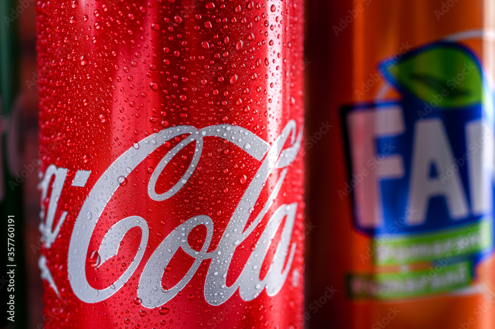 A can, tin of fresh Coca Cola, fanta drink with brick wall backround ...