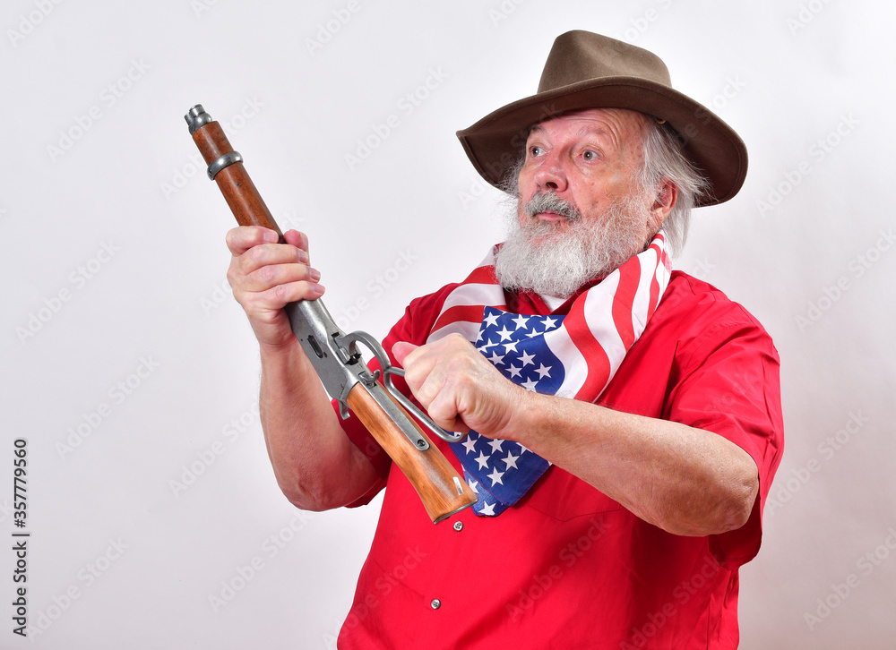 Crazy old man armed with a sawed off rifle, wearing patriotic colors ...