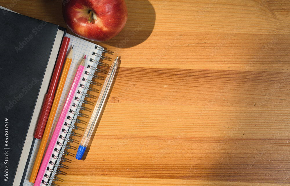 Back to school. Top view of school desk with supplies and accessories ...