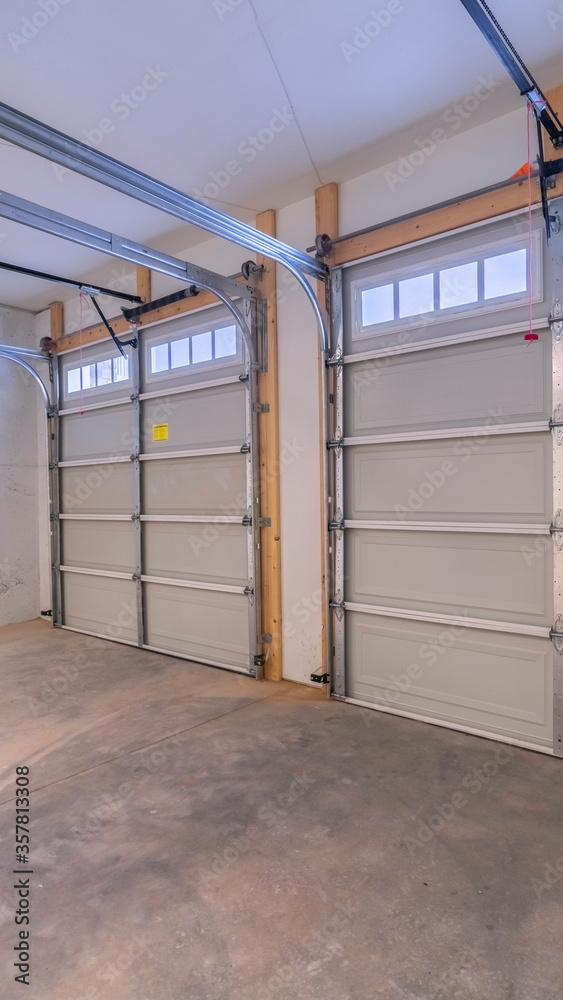Vertical Inside an empty closed garage interior door Stock Photo ...