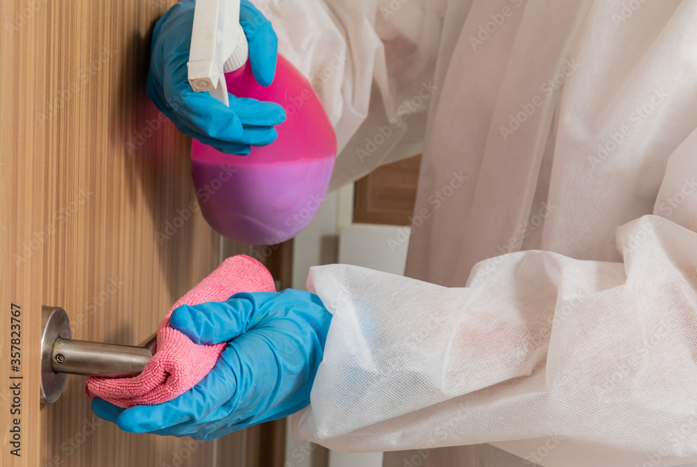 Professional cleaning staff with a To wear protective medical mask and ...