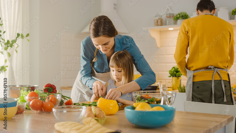 In Kitchen: Mother and Cute Little Daughter Cooking Together Healthy ...