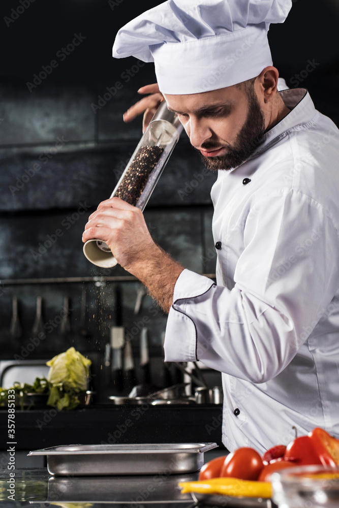 Foto de Chef male at kitchen restaurant. Portrait of chef with ...