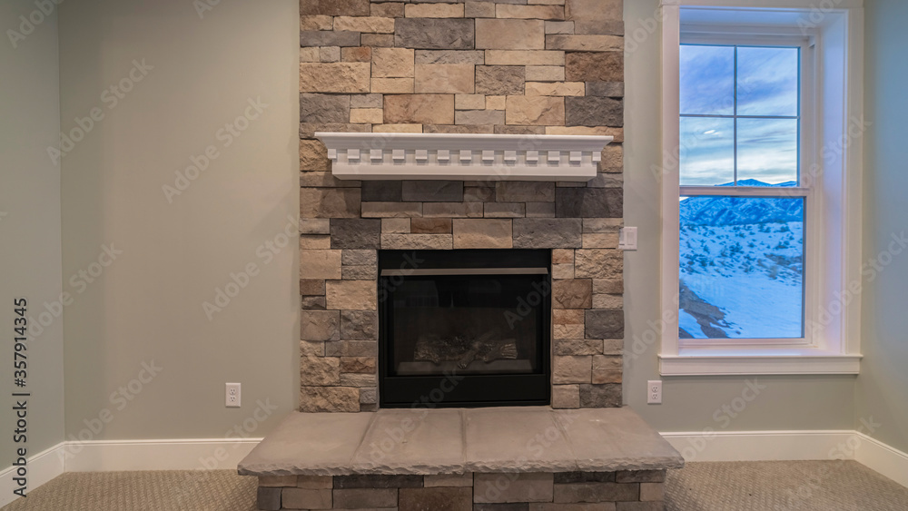 Panorama frame Fire insert in a feature stone brick wall Stock Photo ...