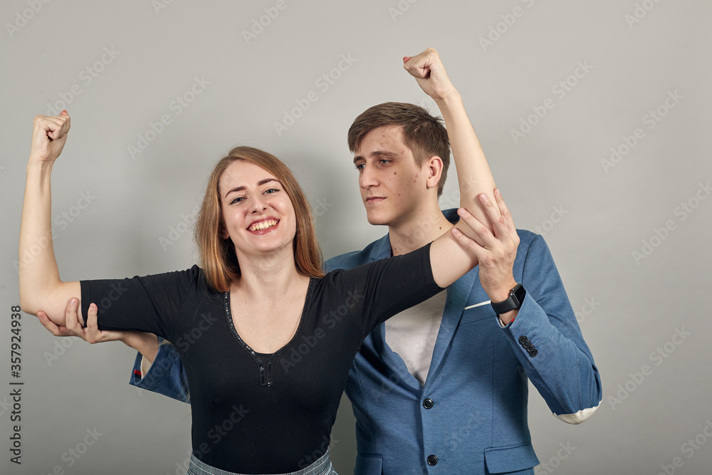 Feels proud have strength, shows great power, raises arms to show ...