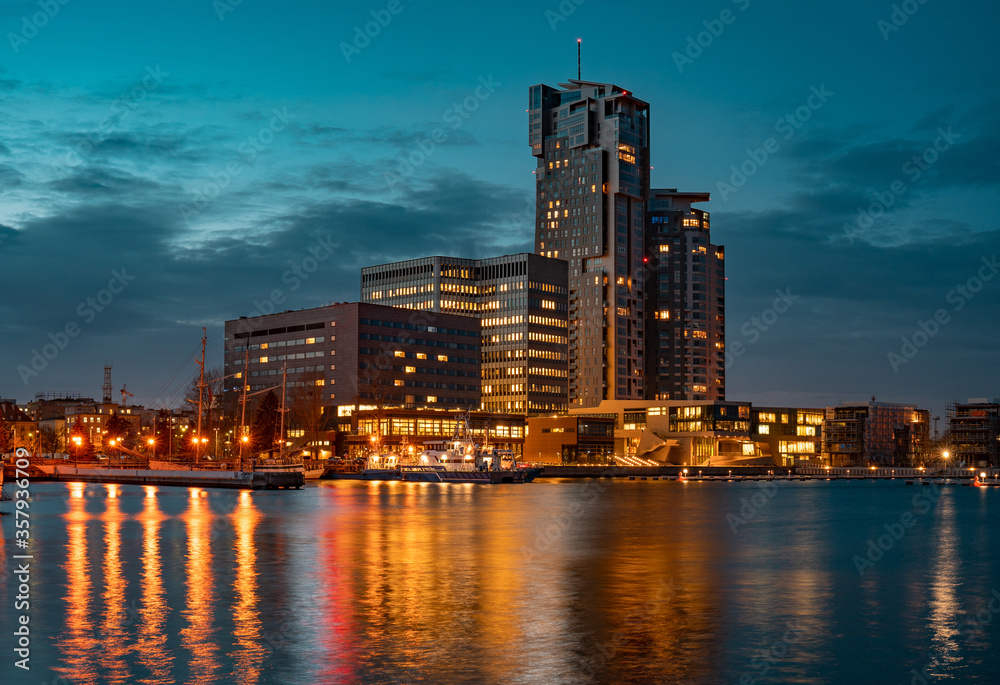 Modern architecture of Sea Towers skyscraper at night in Gdynia, Poland ...