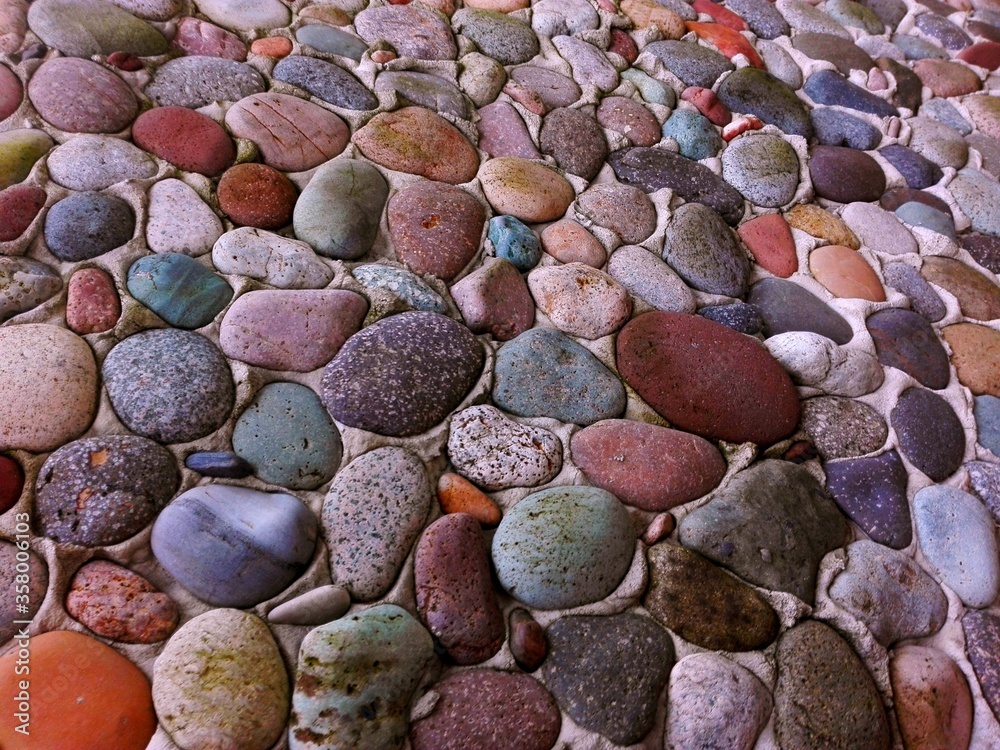 Pebble or rock cobble stone texture wall floor pattern background. Wall ...