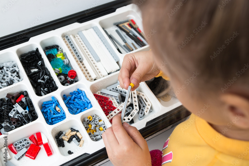 Minsk, Belarus. March, 2018. Boys construct and code robots. Lego ...