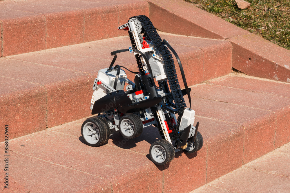 Minsk, Belarus. March, 2018. Boys construct and code robots. Lego ...