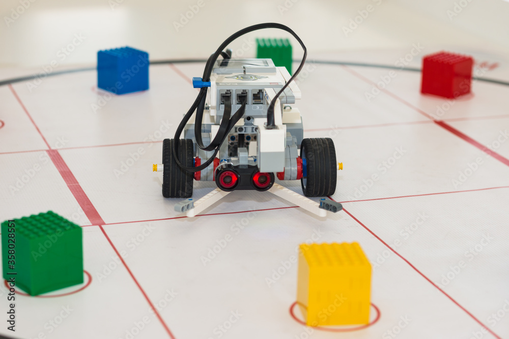 Minsk, Belarus. March, 2018. Boys construct and code robots. Lego ...