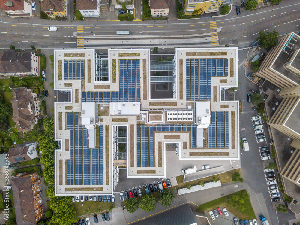 Aerial view of roof with solar cells for photovoltaic power generation ...