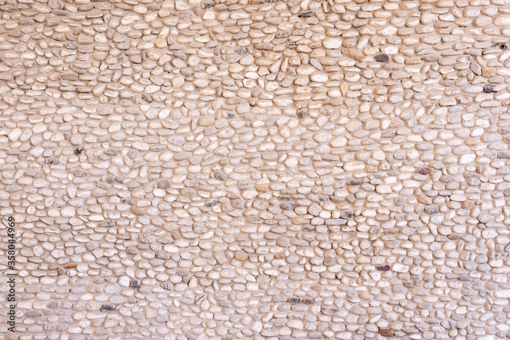 Eine Steinmauer aus vielen Steinen und Zement als Hintergrund Stock ...