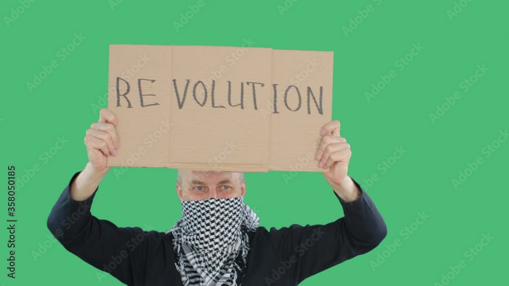 Protester with revolution banner during political demonstration of ...