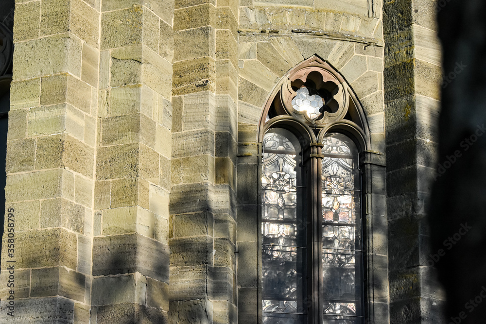 shadow of trees in the window of a church. old church window Stock ...