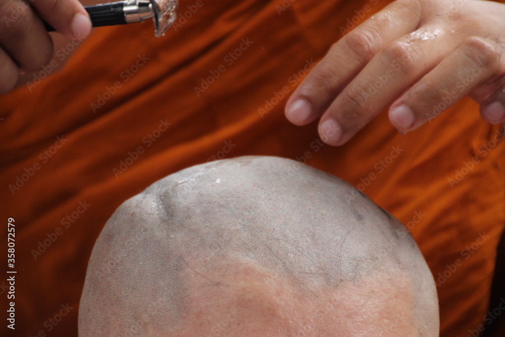 shaving hair in ordination ceremony to be monk tradition Stock Photo ...