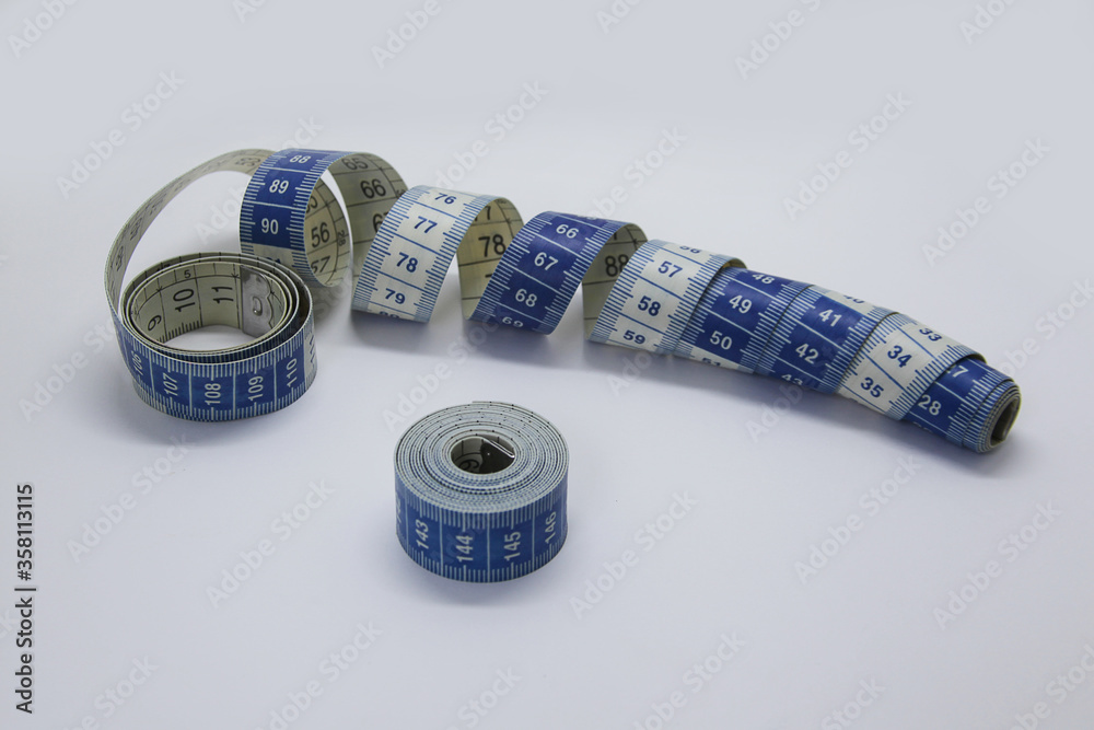 The plastic measuring tape is an instrument used to measure distances ...