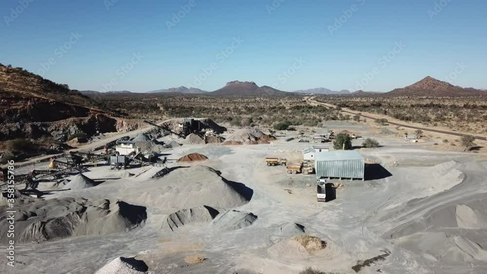 4K aerial drone video of African savanna hills, stone quarry near ...