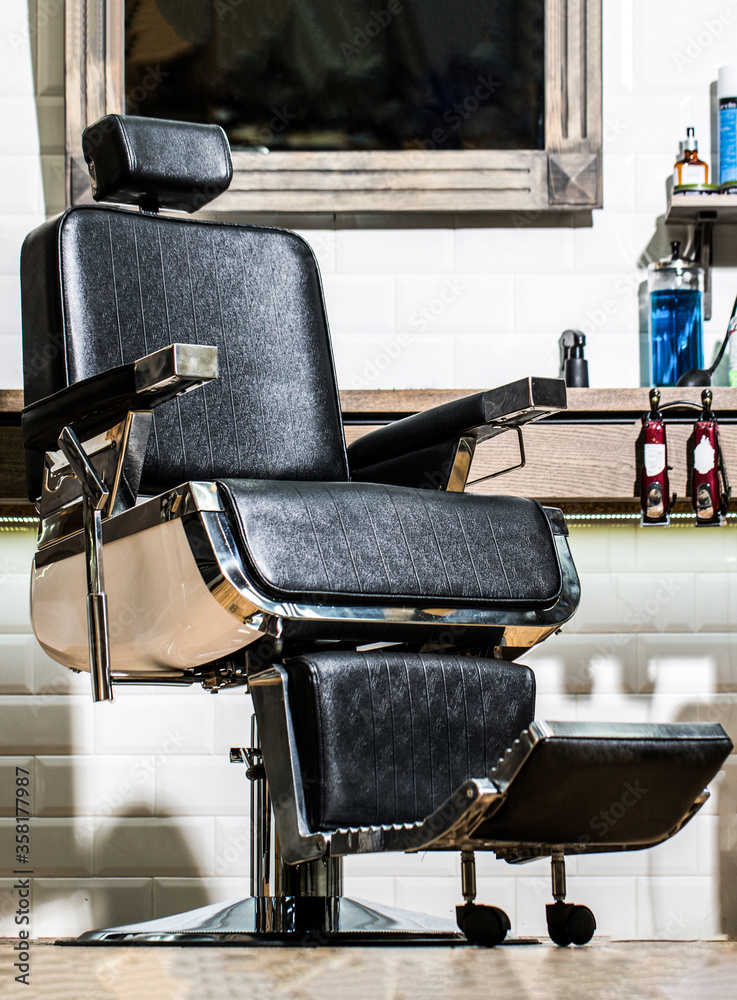 Professional hairstylist in barbershop interior. Barbershop interior ...