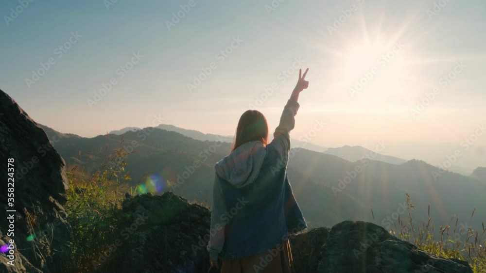 Back view of strong woman standing and fighting motivation feeling on ...