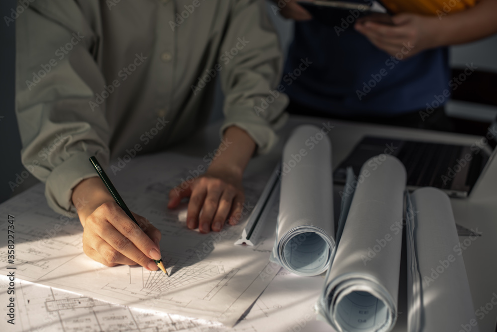 Architect working on blueprint. Architects workplace - architectural ...