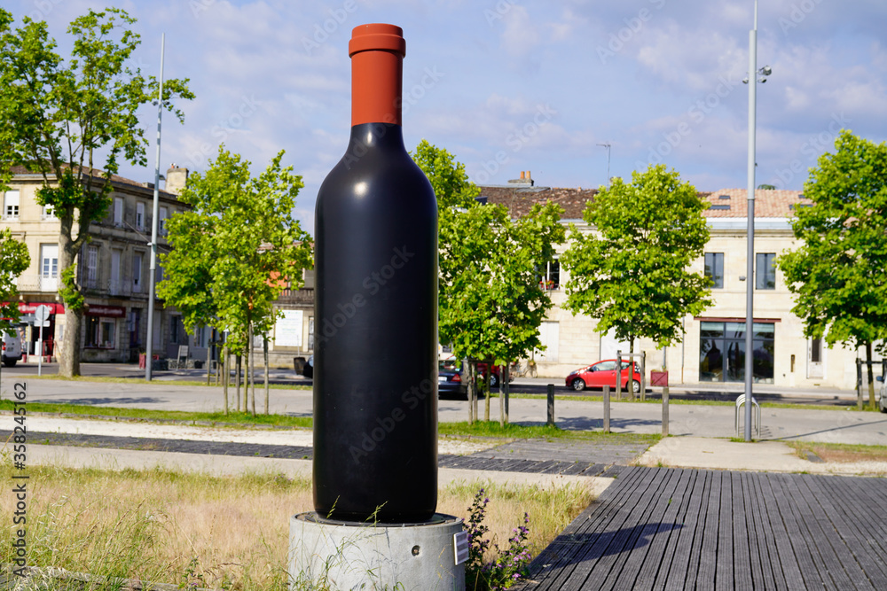 Foto de big giant bottle of wine on the pauillac quays do Stock | Adobe ...