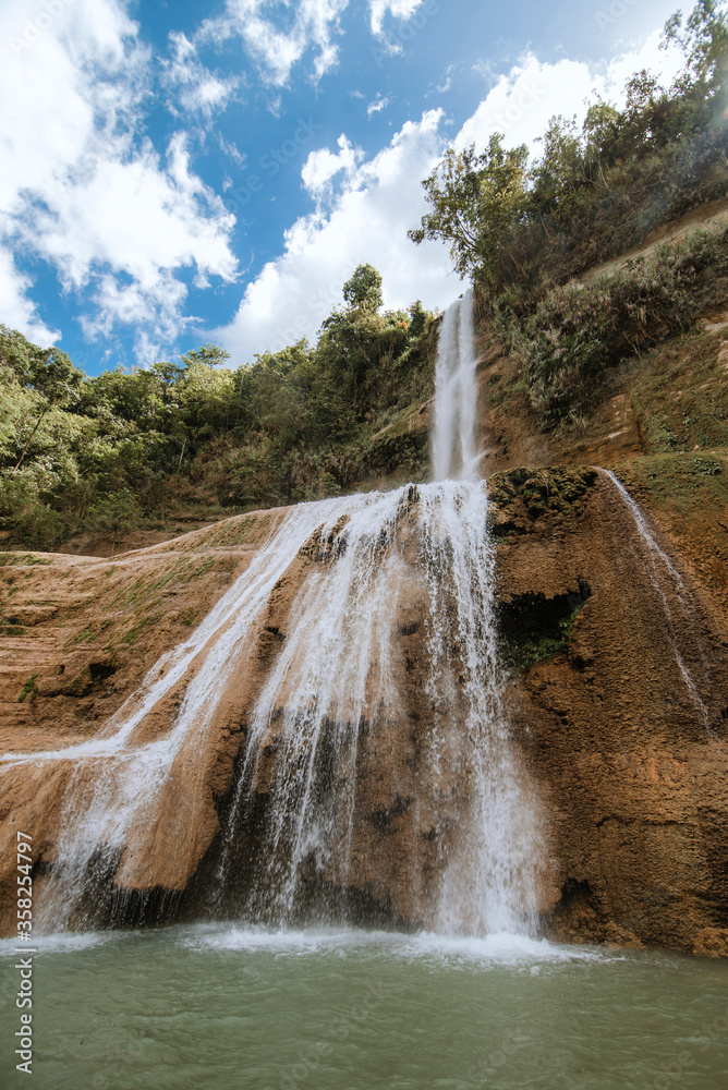 nature stamp with a beautiful waterfall on the island of bohol in the ...