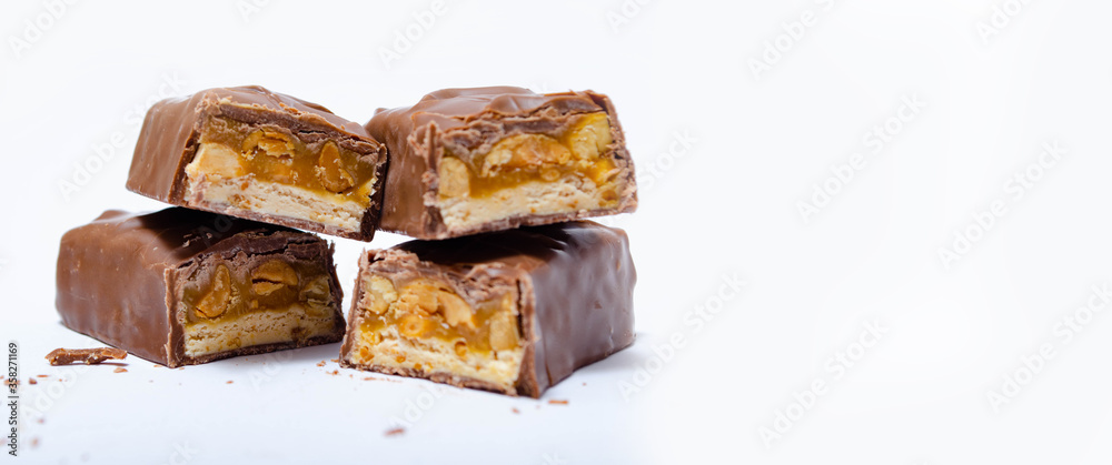 Two small snickers bars weighing 50 grams without packaging in macro ...