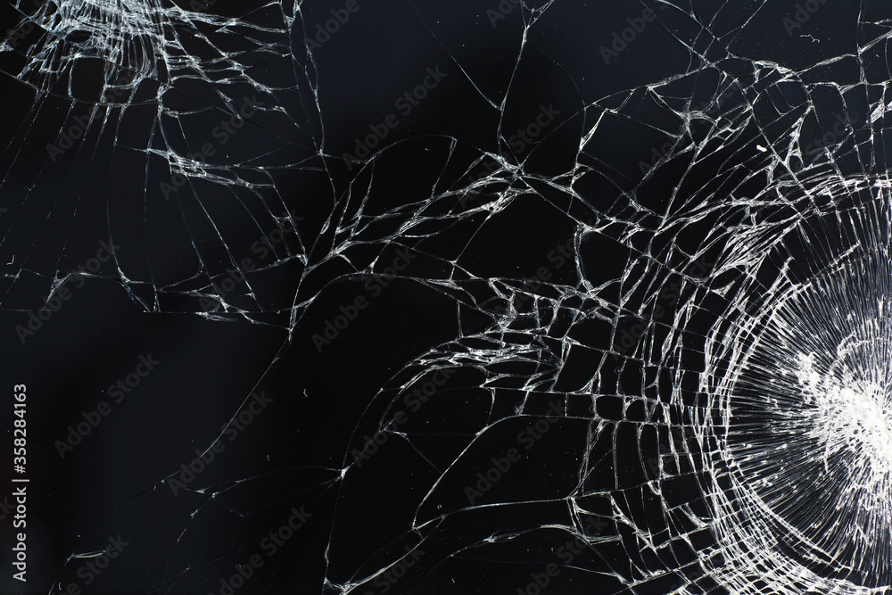 Crack on the glass. Broken screen. Broken phone. Cracked glass ...