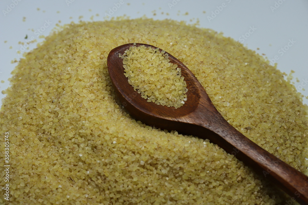 Raw Semolina flour or Rava powder isolated in white background Stock ...