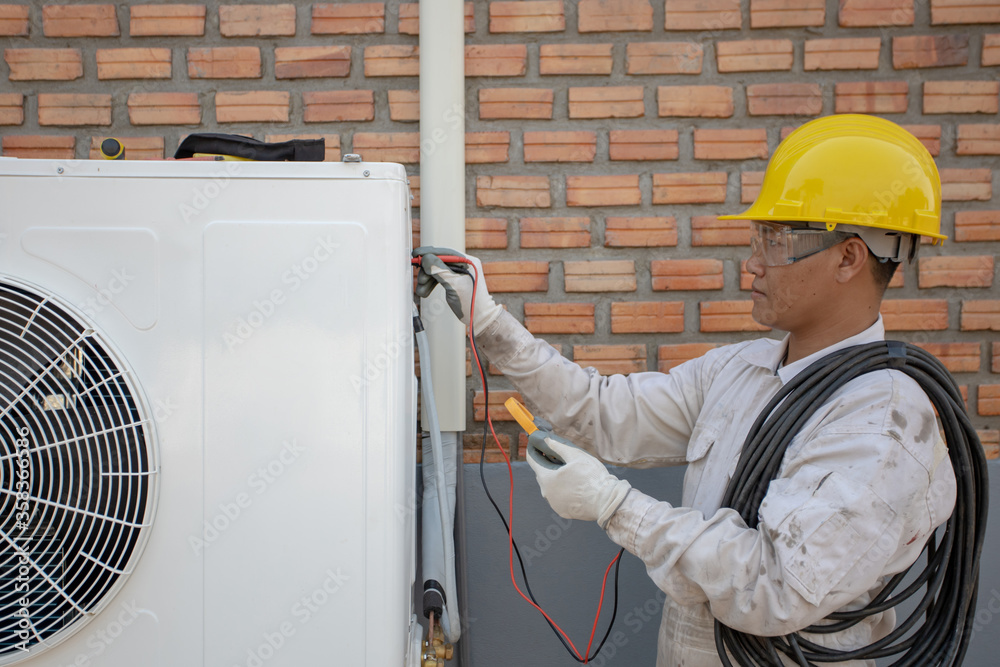 Air Conditioning Technician and A part of preparing to install new air ...