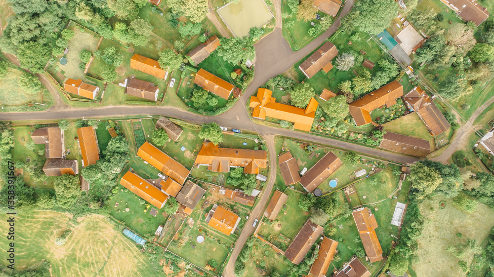 Aerial view of a small village.Top view of traditional housing estate ...