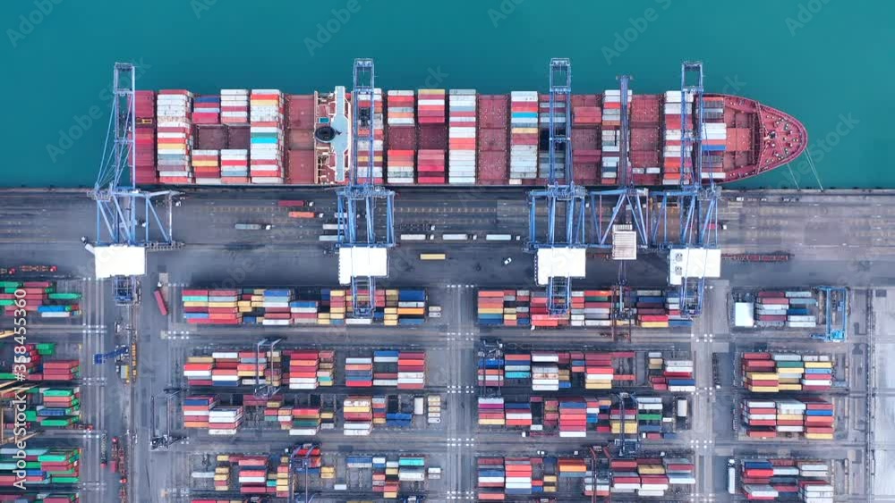 Time lapse over international container cargo ship at industrial import ...