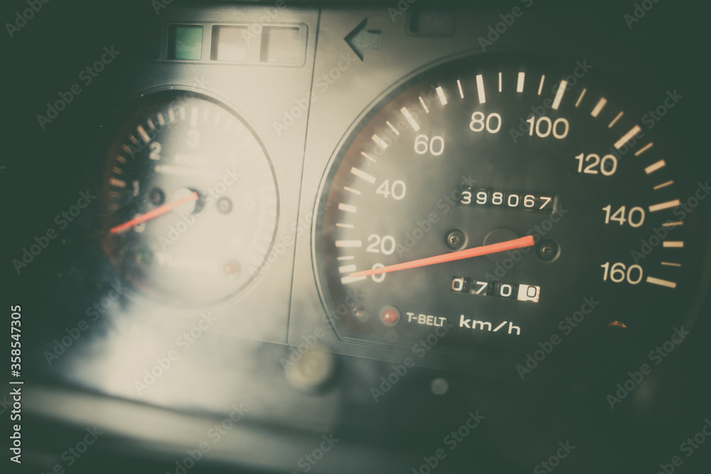 Speedometer on a vintage car's dashboard Stock Photo | Adobe Stock